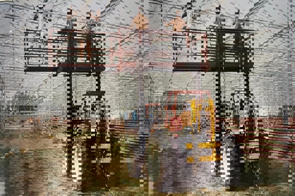 Going back 33 years in greenhouse construction with construction tractors